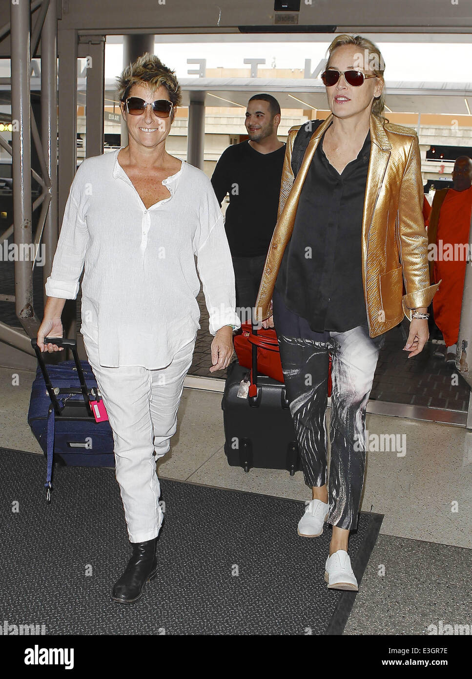 'Basic Instinct' actress Sharon Stone departs from LAX with a friend ...