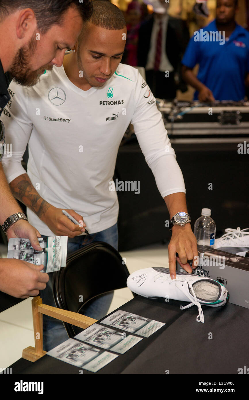 Lewis Hamilton signs autographs for Formula 1 fans at Shoe Palace at ...