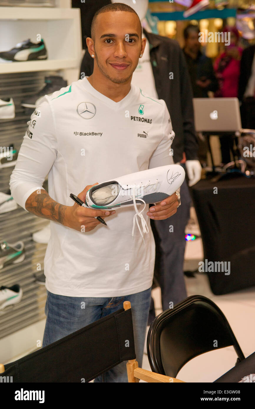 Lewis Hamilton signs autographs for Formula 1 fans at Shoe Palace at ...