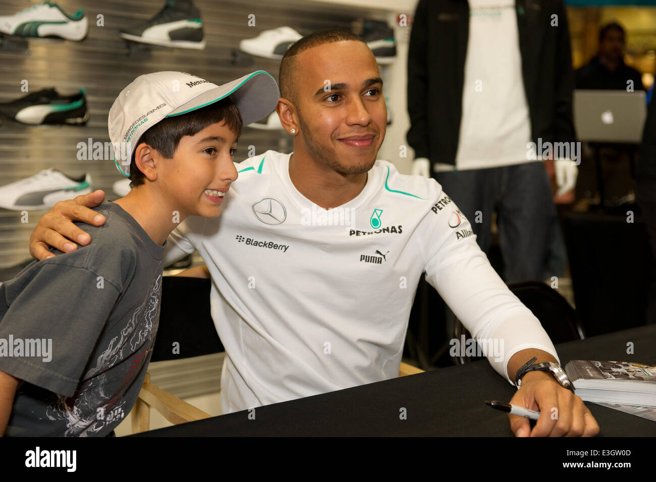 Lewis Hamilton signs autographs for Formula 1 fans at Shoe Palace at ...