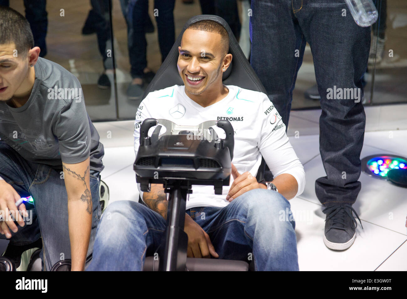 Lewis Hamilton signs autographs for Formula 1 fans at Shoe Palace at ...
