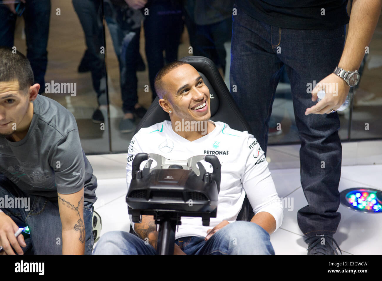 Lewis Hamilton signs autographs for Formula 1 fans at Shoe Palace at ...