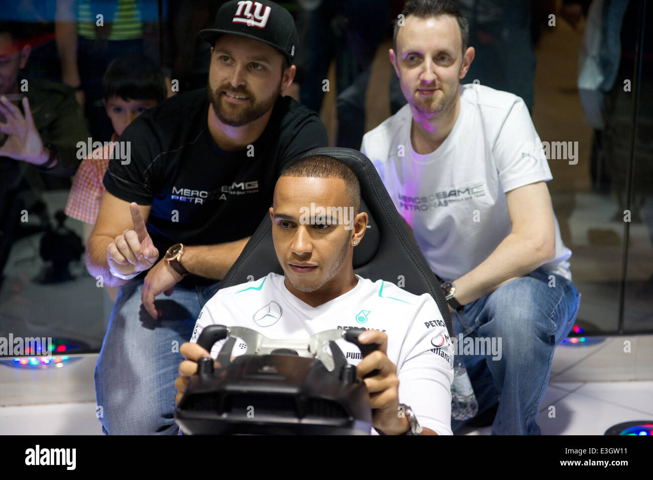 Lewis Hamilton signs autographs for Formula 1 fans at Shoe Palace at ...