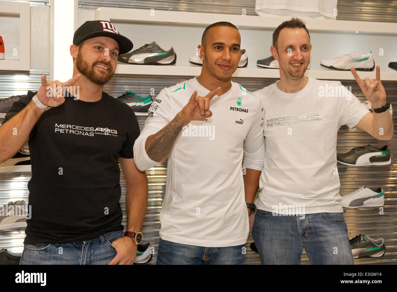 Lewis Hamilton signs autographs for Formula 1 fans at Shoe Palace at ...
