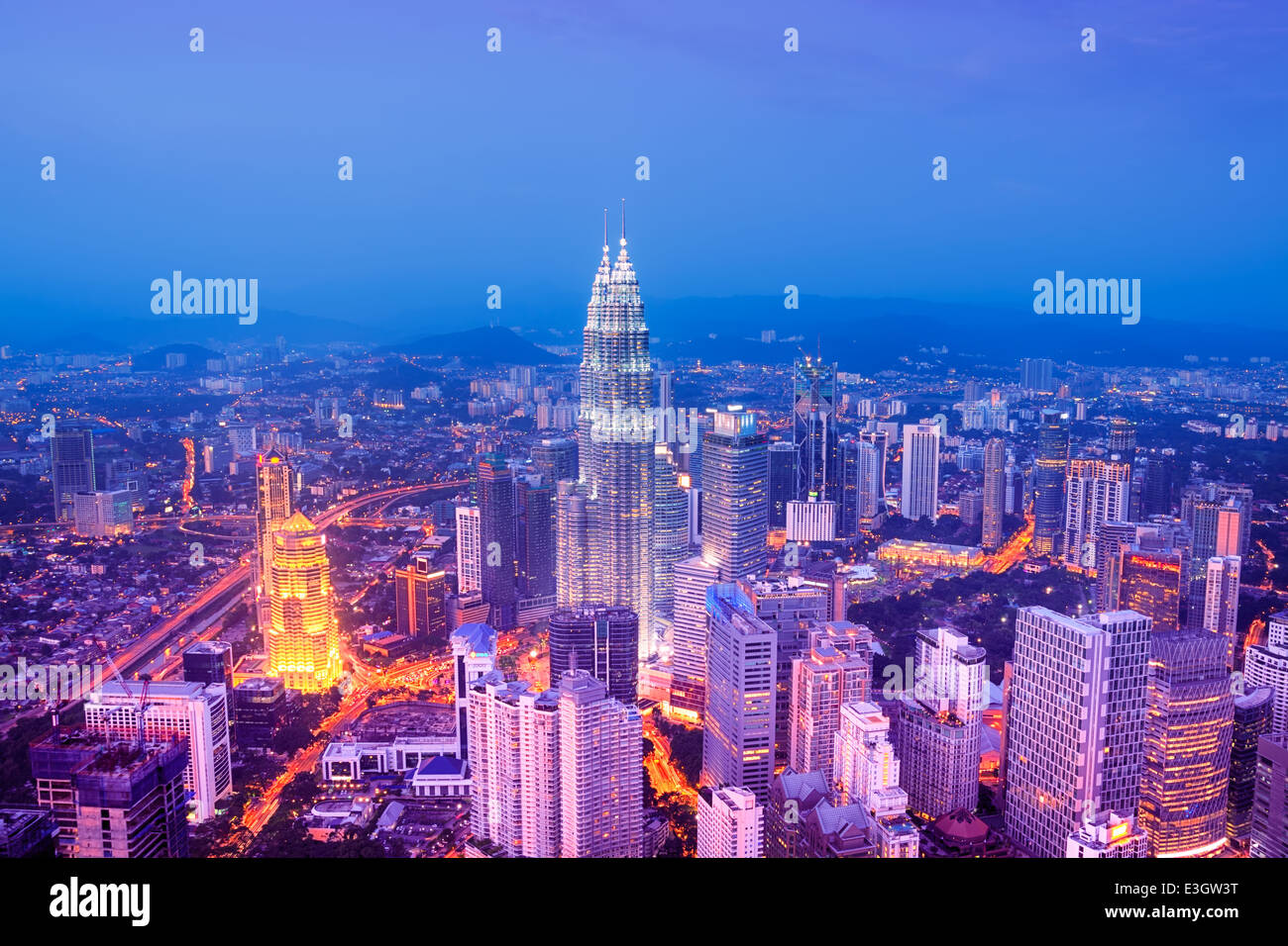 Kuala Lumpur skyline with the Petronas Towers and other skyscrapers ...