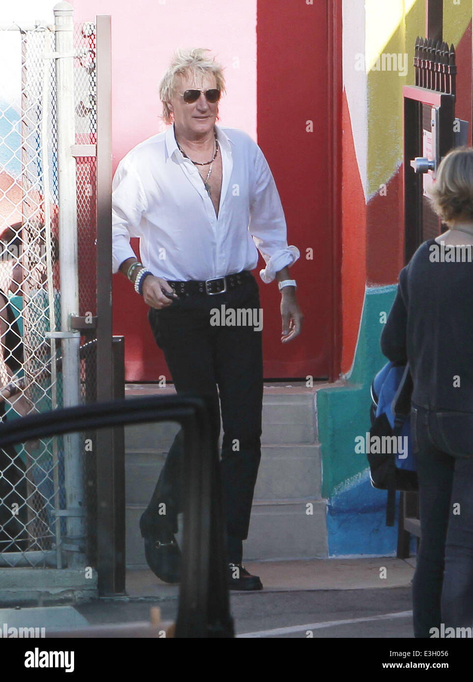 Roccker Rod Stewart walks from a school in Los Angeles after visiting ...