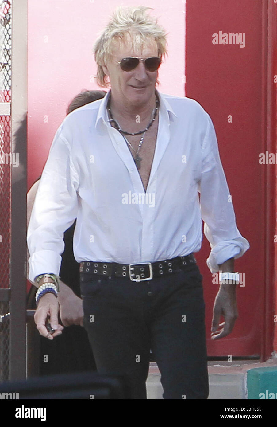 Roccker Rod Stewart walks from a school in Los Angeles after visiting ...