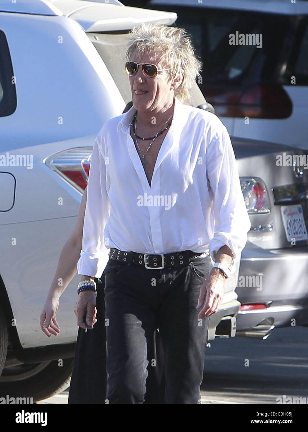 Roccker Rod Stewart walks from a school in Los Angeles after visiting ...