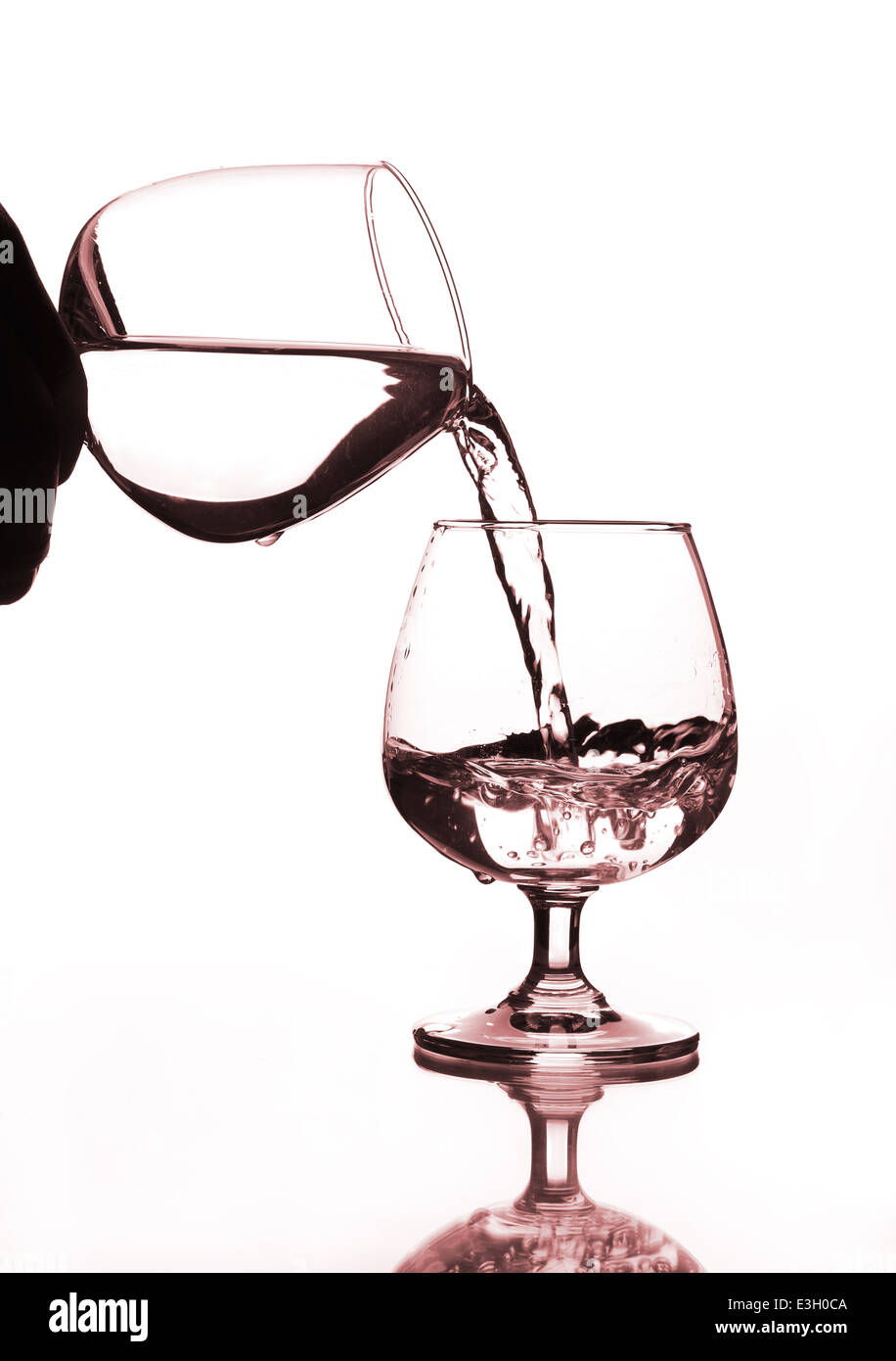 wine glass water pouring to wine glass with shadow Stock Photo - Alamy