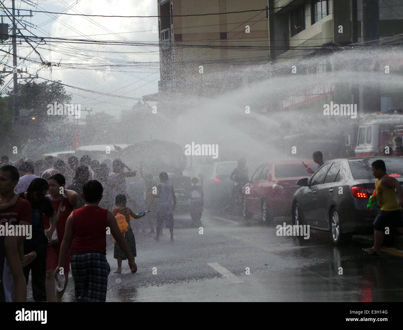 San Juan, Metro Manila, Philippines. June 24, 2014. Revelers observing ...