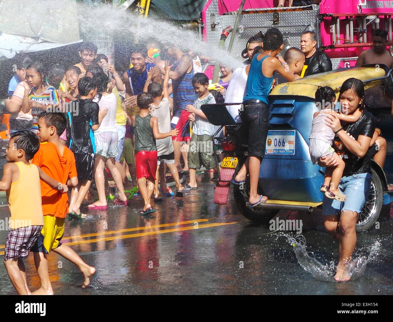 San Juan, Metro Manila, Philippines. June 24, 2014. Revelers observing ...