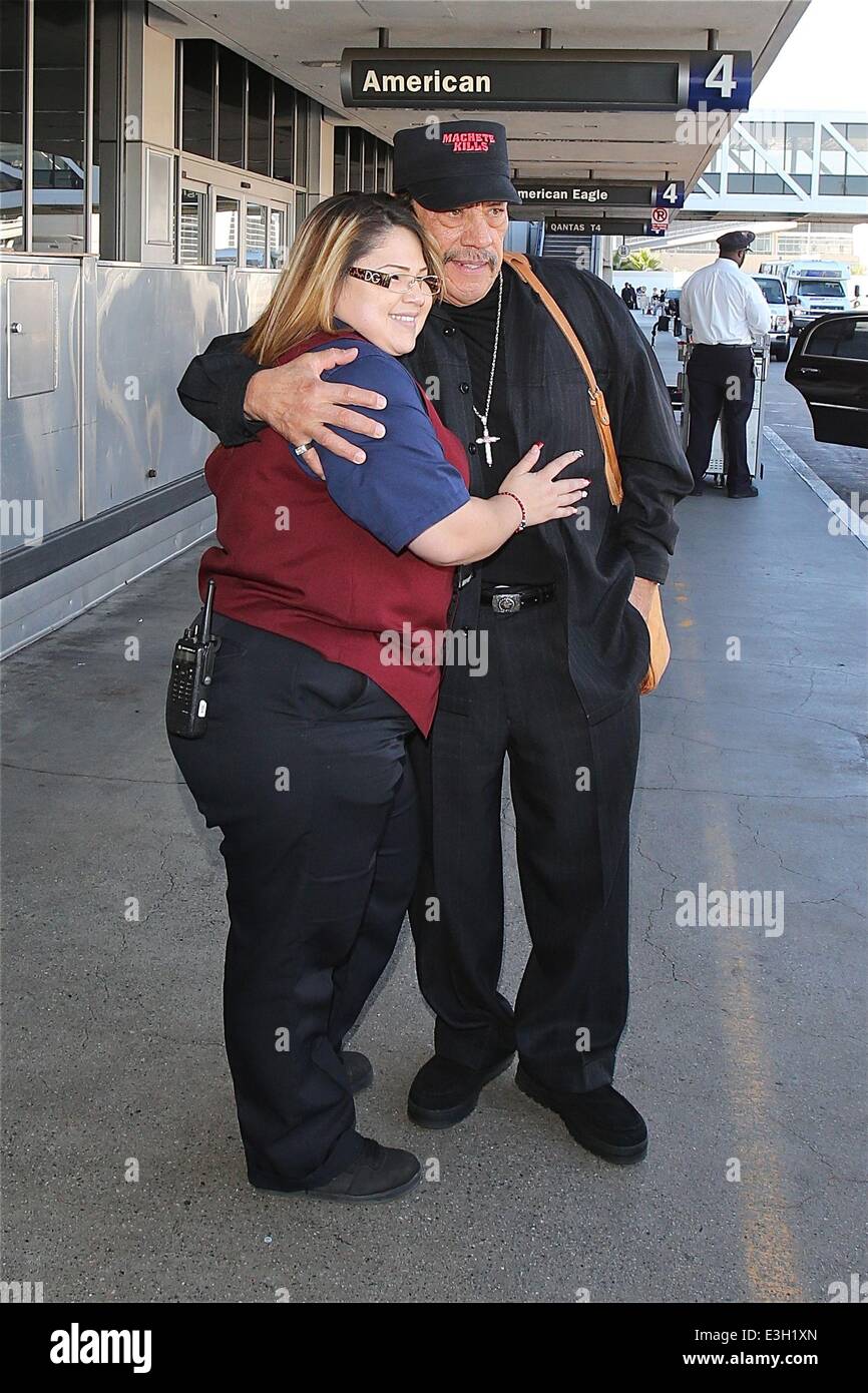 Danny Trejo wears his Machete hat at LAX and poses with TSA employee ...