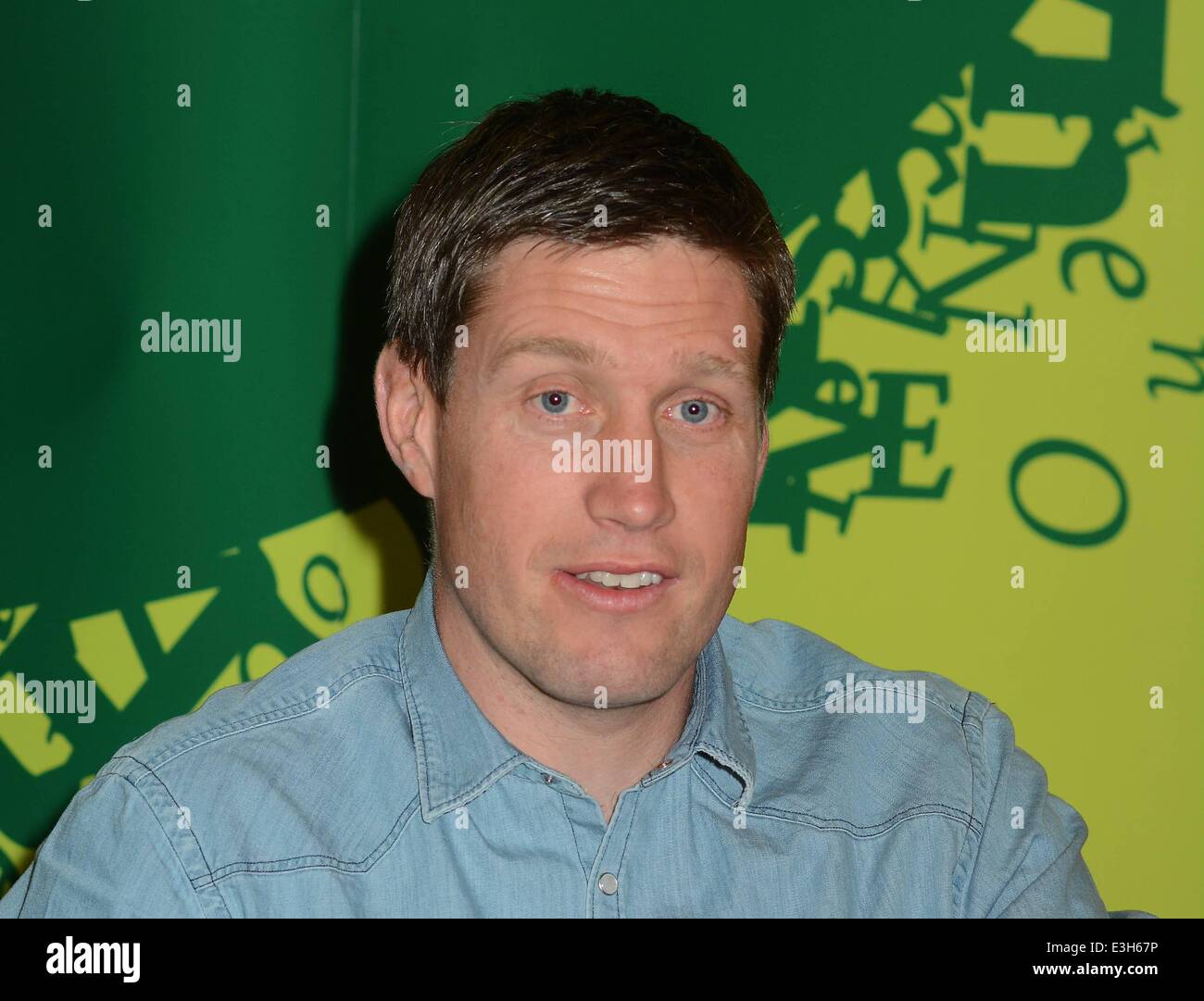 Rugby player Ronan O'Gara signs copies of his book 'Unguarded' at ...