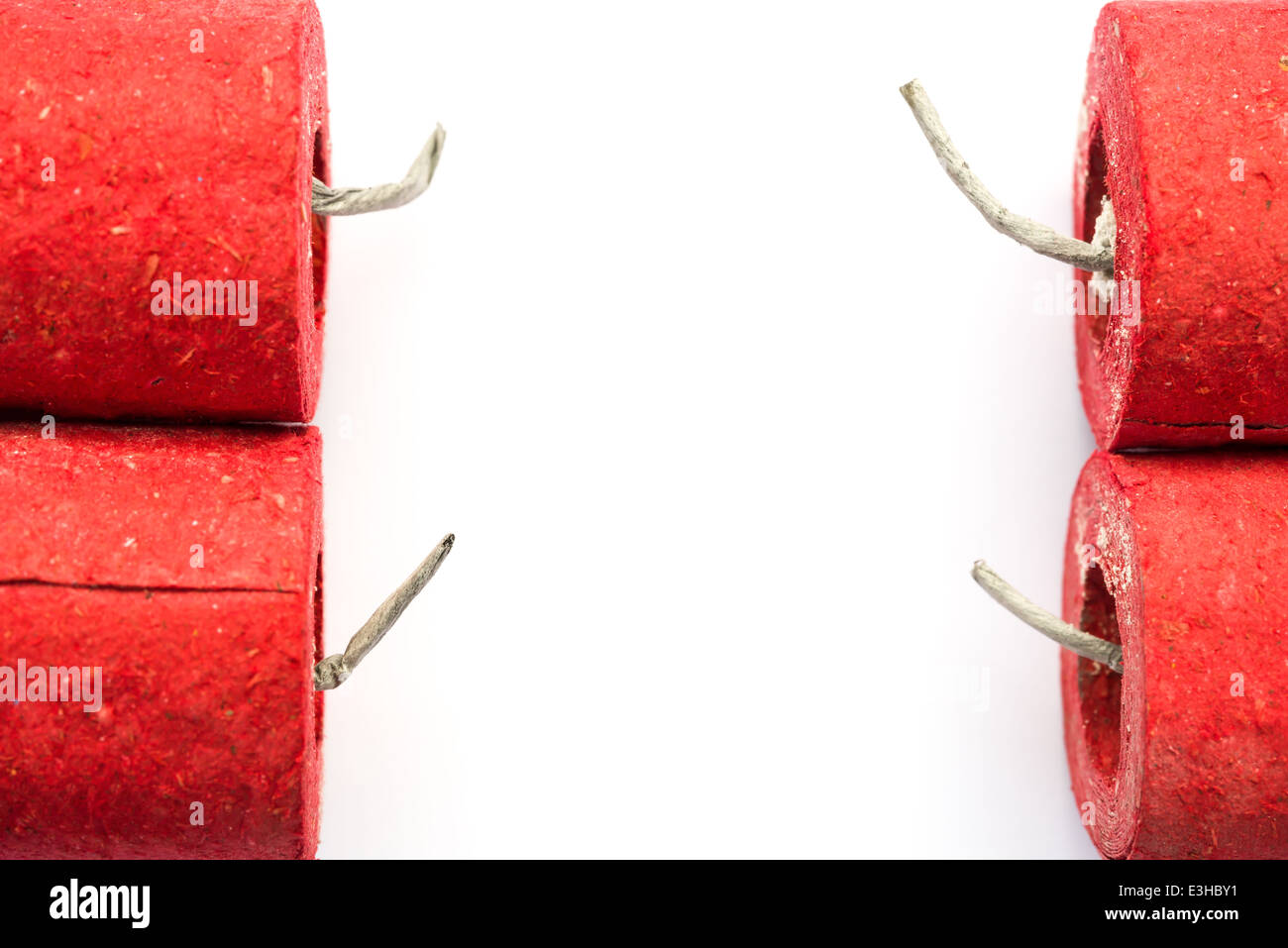 red firecrackers on a white background with copy space Stock Photo - Alamy