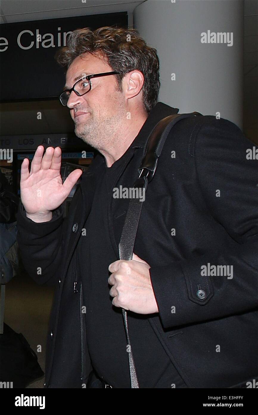Matthew Perry arrives at LAX from Canada in his Canadian cold weather ...