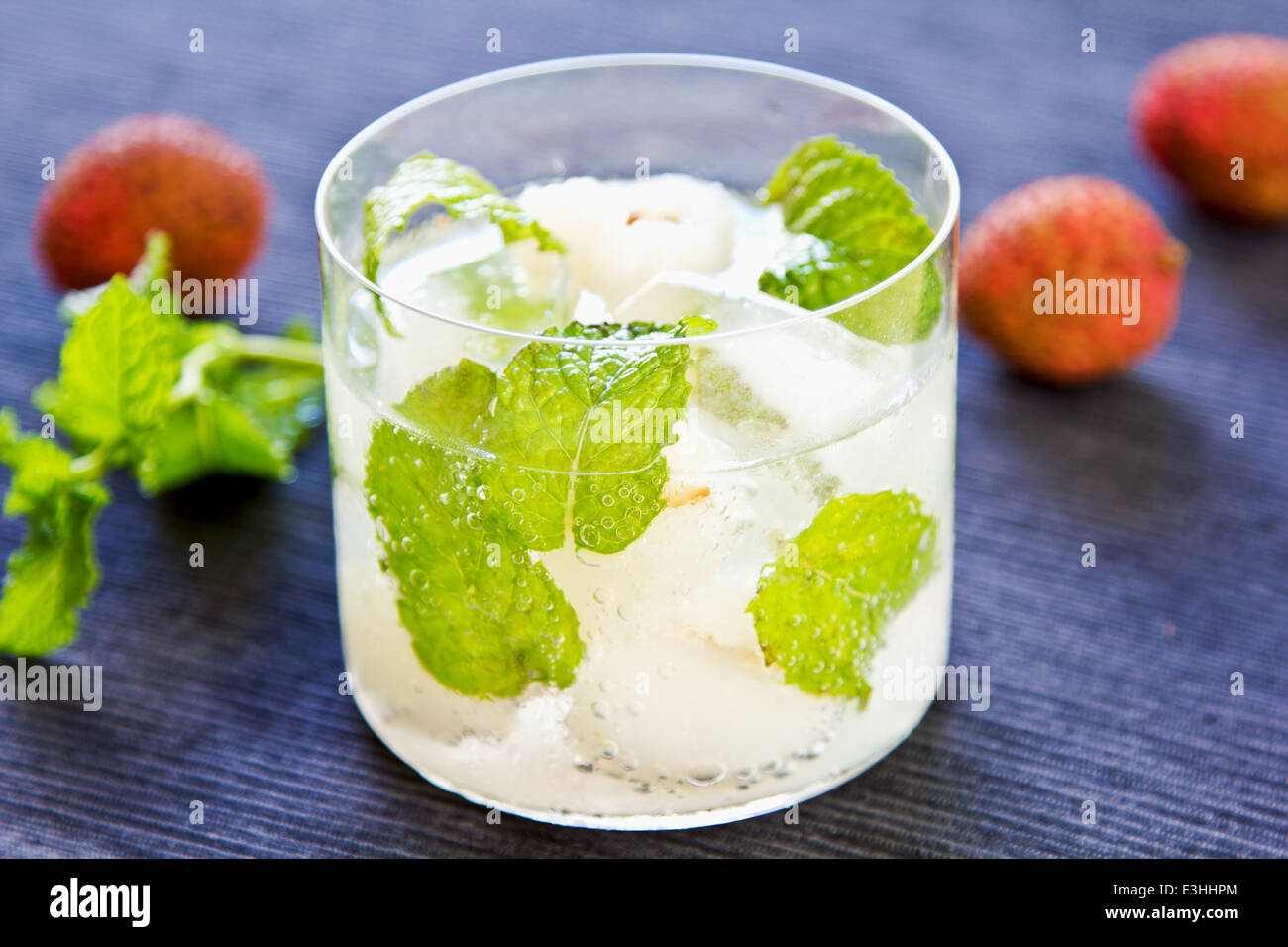 Lychee fizzy drink with mint Stock Photo - Alamy
