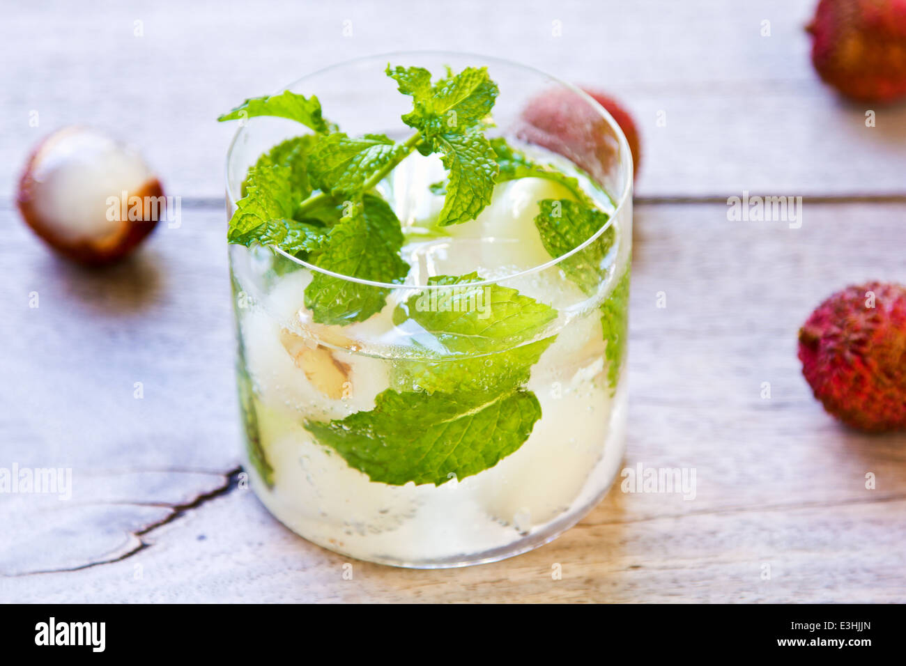 Lychee fizzy drink with mint Stock Photo - Alamy