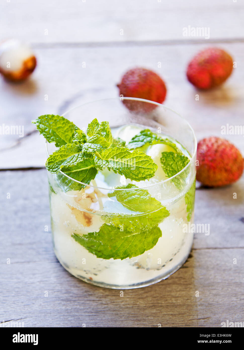 Lychee fizzy drink with mint Stock Photo - Alamy
