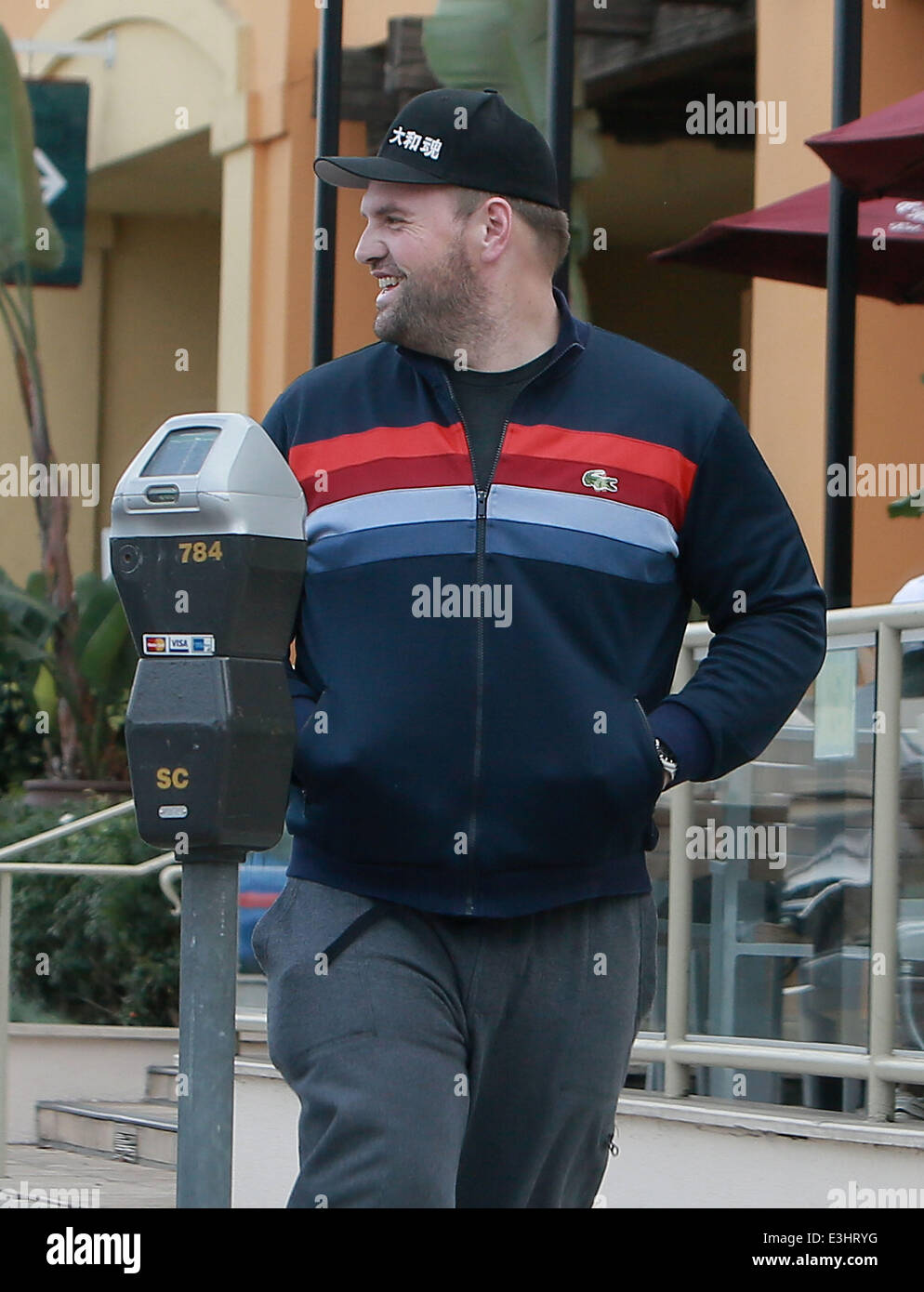 Actor Ethan Suplee chats with a friend on the sidewalk in Los Angeles ...