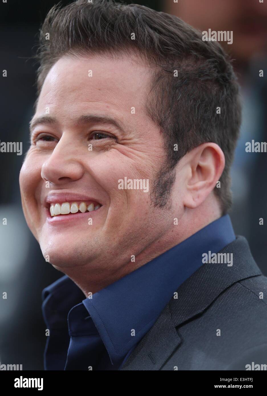 Chaz Bono appears on 'Extra' at Universal CityWalk and shows off his ...