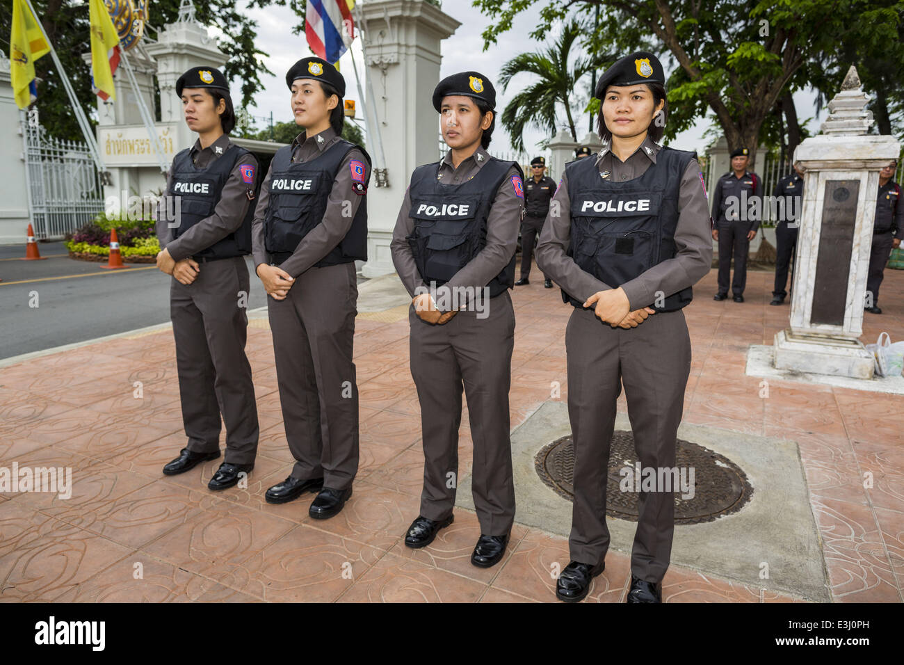Bangkok, Thailand. 24th June, 2014. Thai police officers line the ...