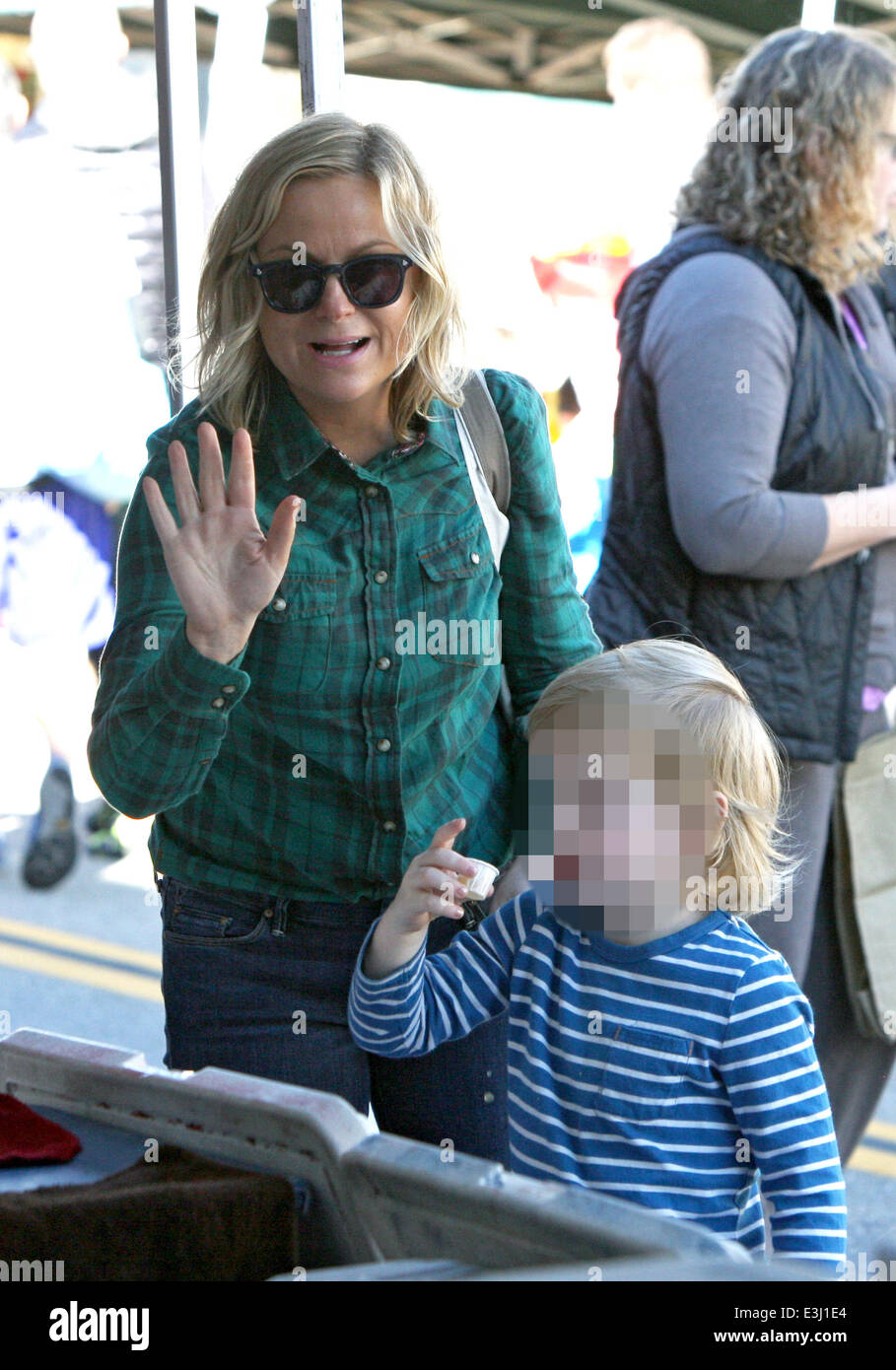 Amy Poehler with her sons at the Farmers Market in Beverly Hills ...