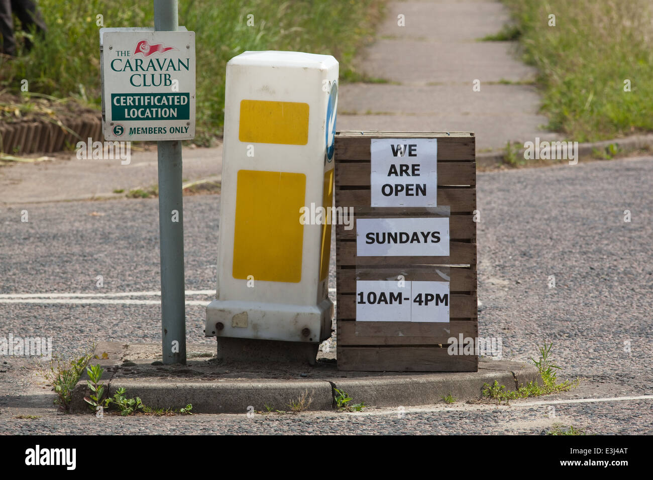 Sign out side a farm shop and garden centre. Announcing 'We are open on ...