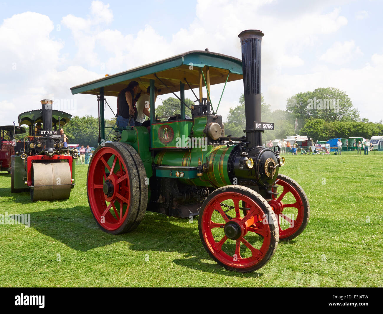 Steam traction engines and steam rollers on parade at a steam and ...