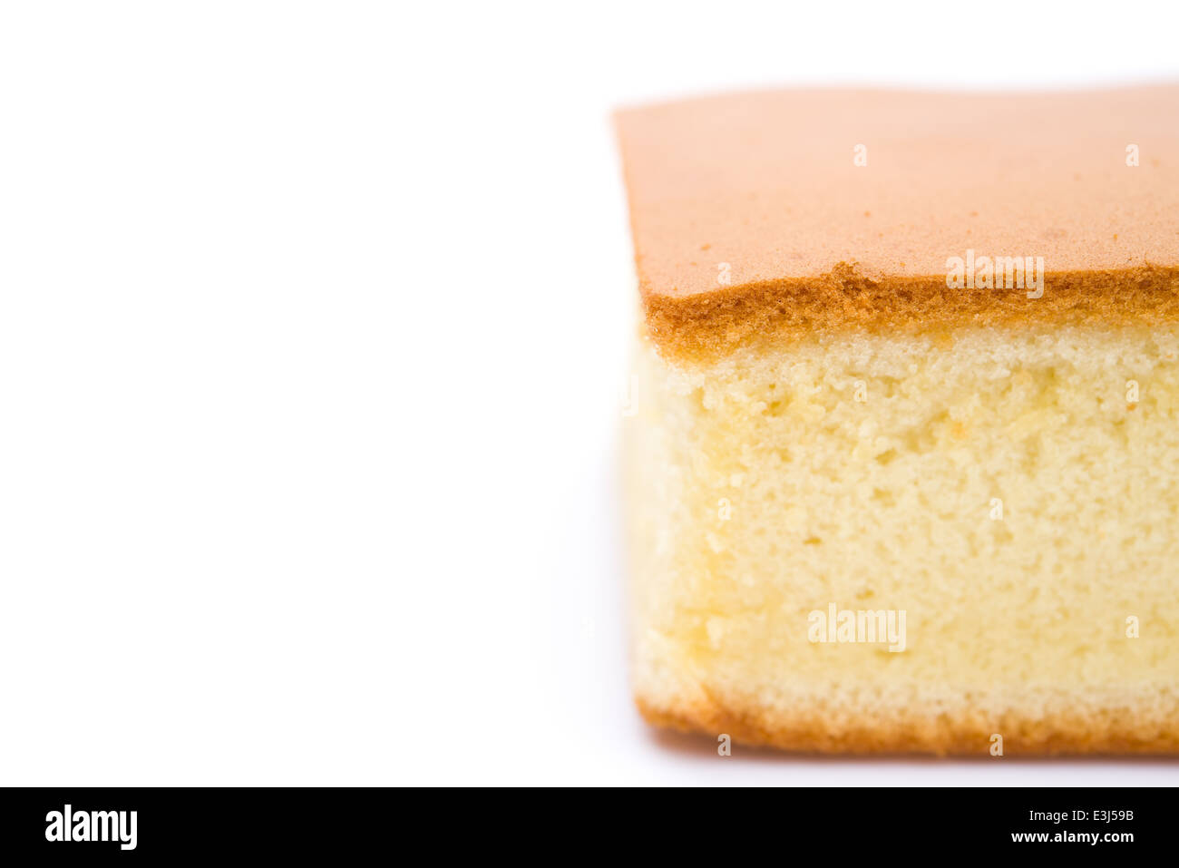 sponge cake on white with copy space Stock Photo - Alamy