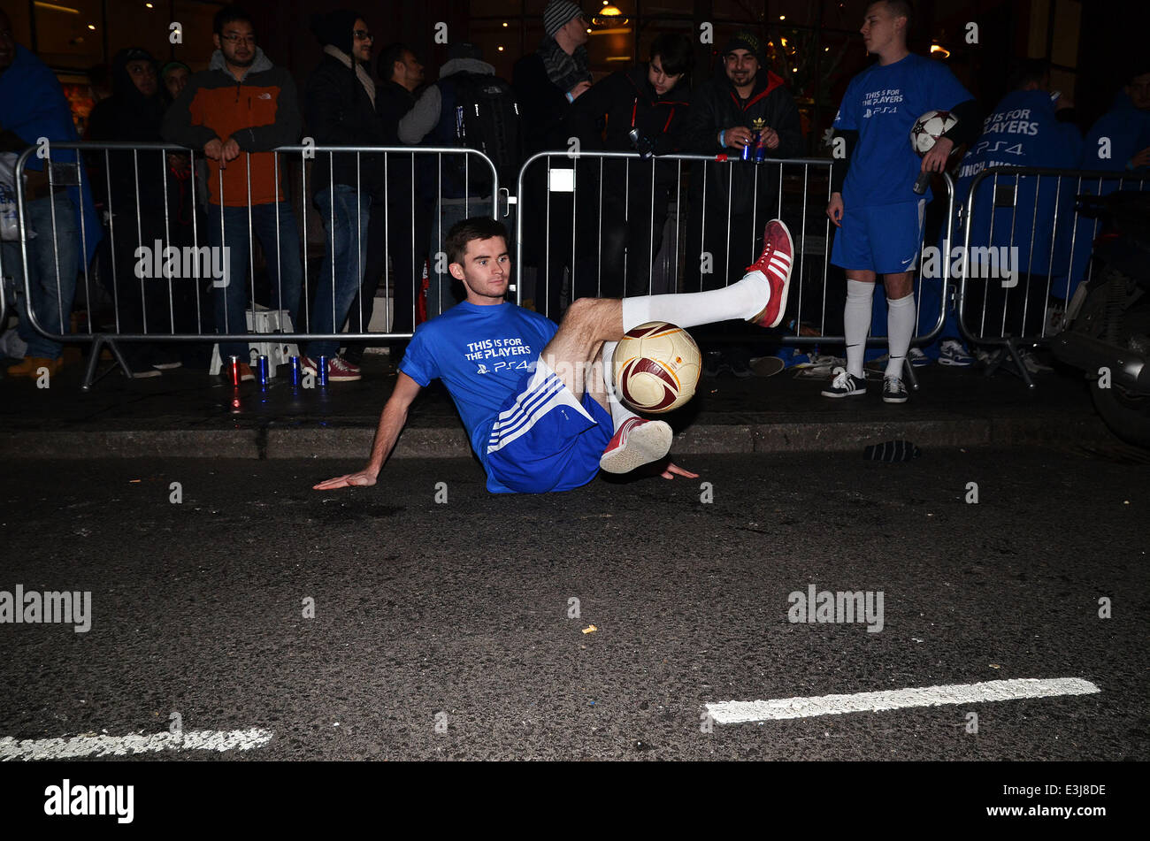 Gaming fans queue up outside the PS4 lounge in Covent Garden ahead of ...