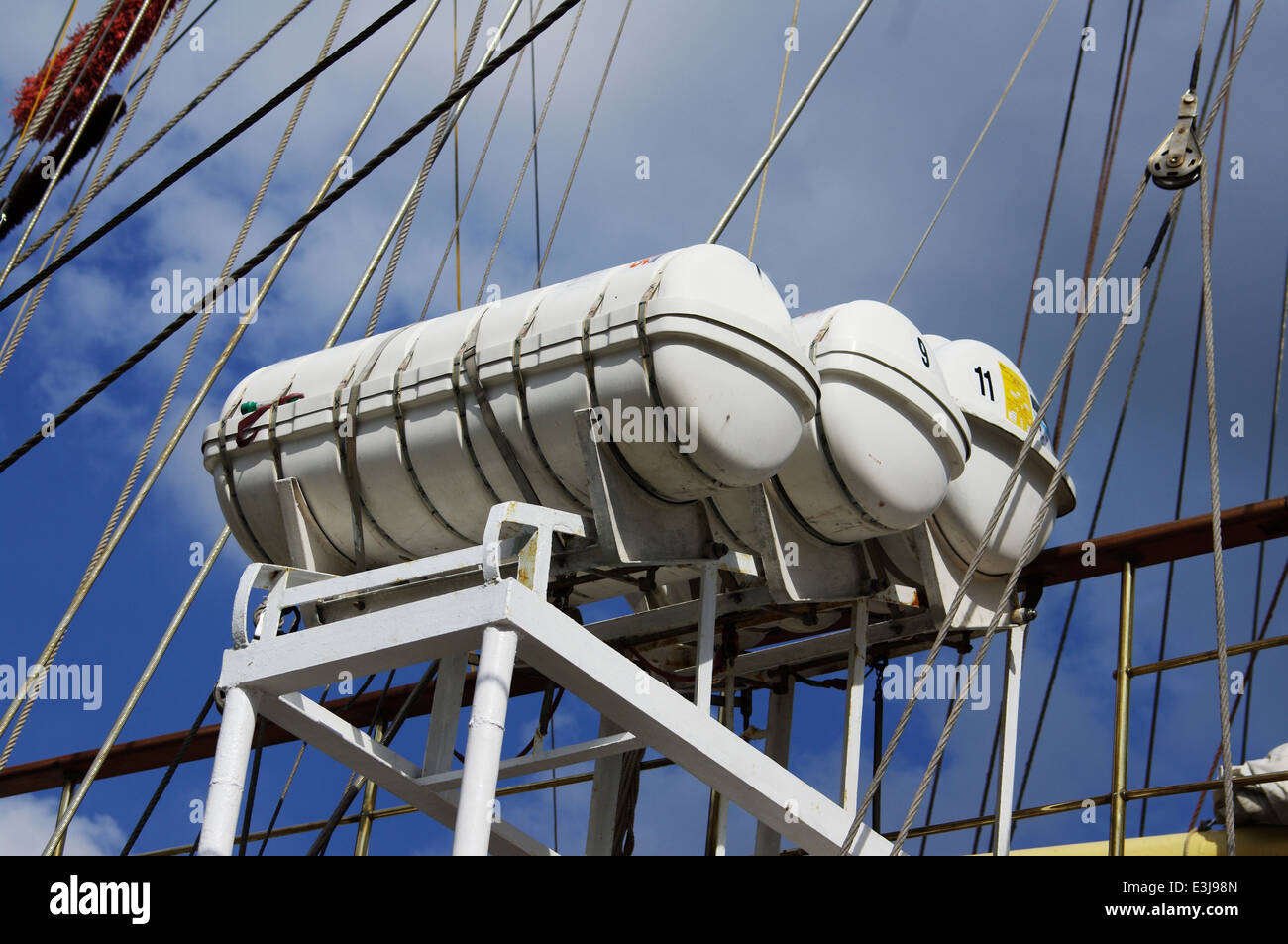 rescue rafts of sailing-ship on background of sky Stock Photo - Alamy