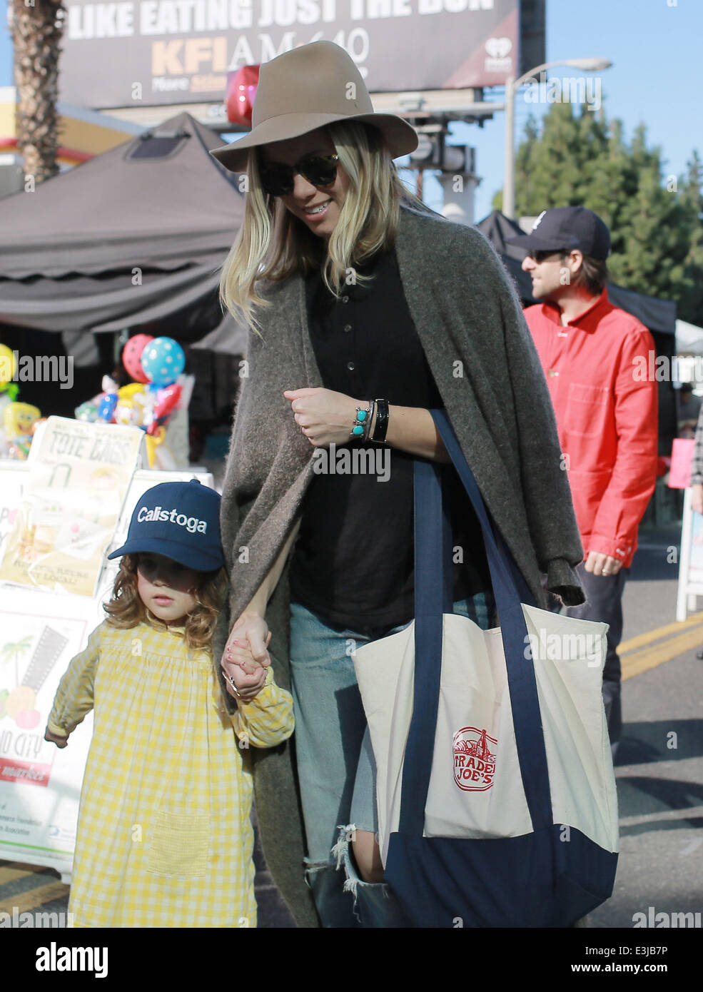 Actor Jason Schwartzman walks with his wife Brady Cunningham and ...