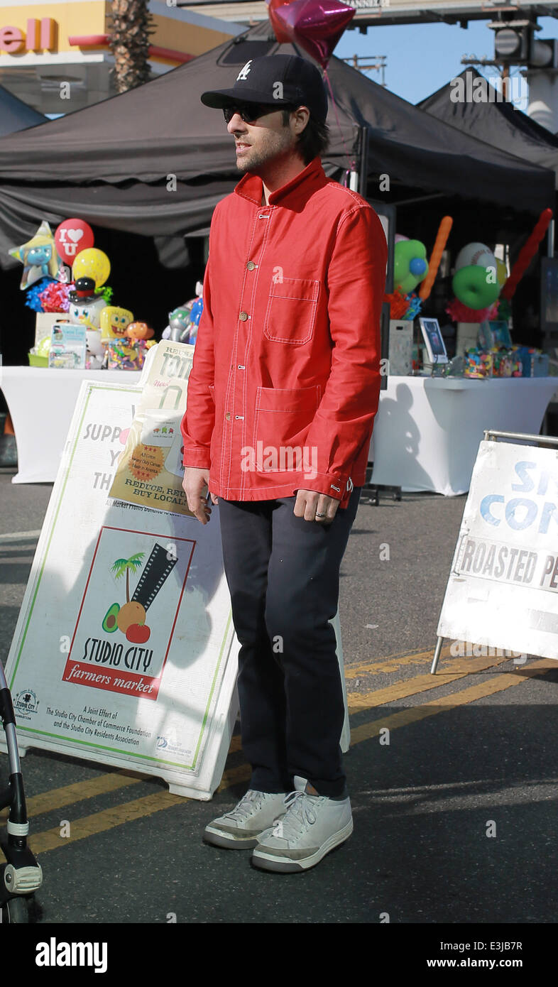Actor Jason Schwartzman walks with his wife Brady Cunningham and ...