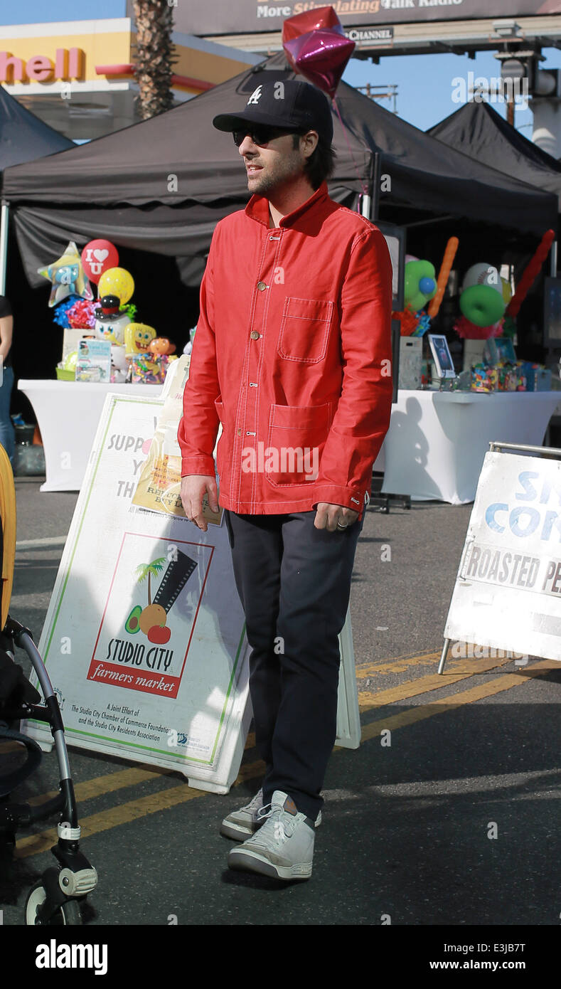 Actor Jason Schwartzman walks with his wife Brady Cunningham and ...