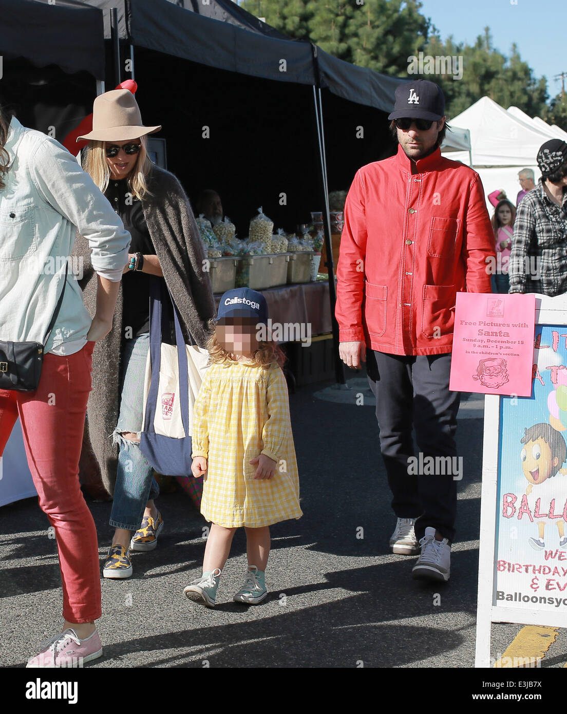 Actor Jason Schwartzman walks with his wife Brady Cunningham and ...