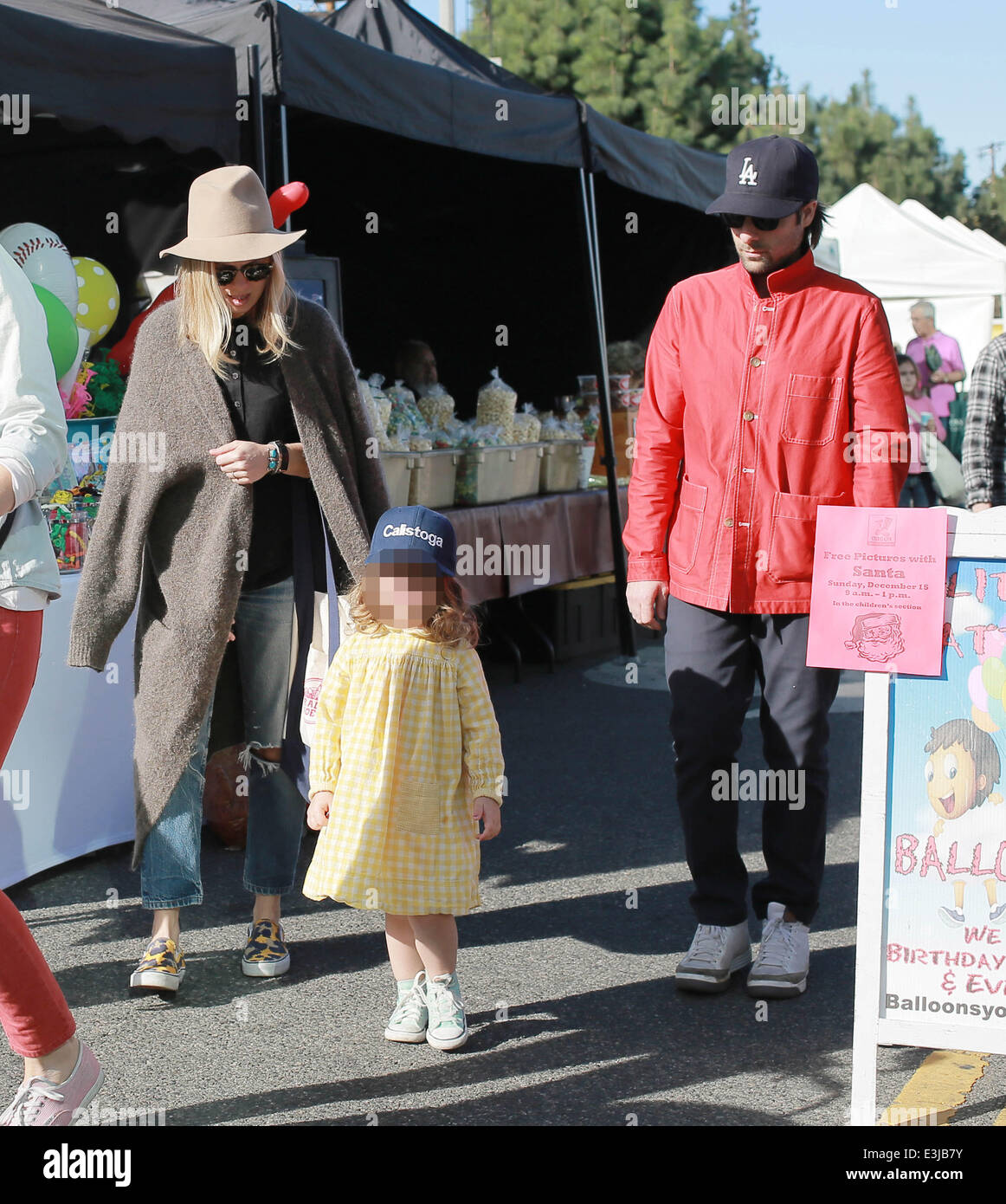 Actor Jason Schwartzman walks with his wife Brady Cunningham and ...