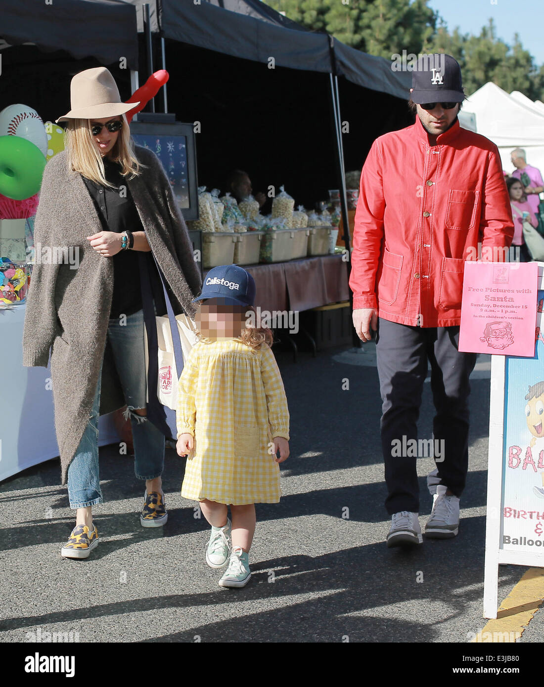 Actor Jason Schwartzman walks with his wife Brady Cunningham and ...