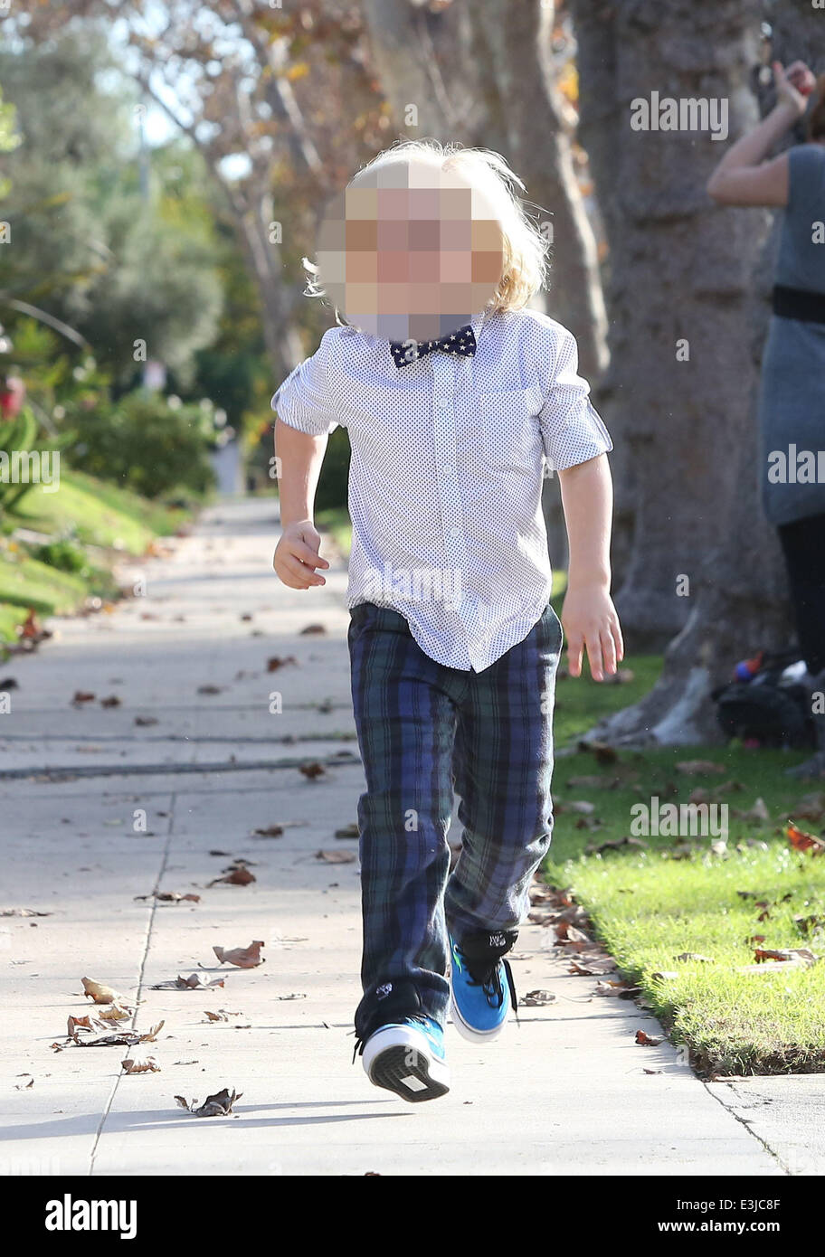 Gwen Stefani in scarlet red and black, visits her mother's homewith ...