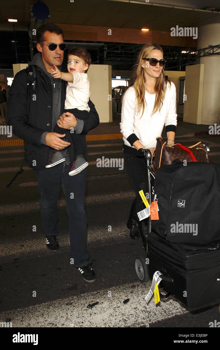 Molly Sims arrives at LAX (Los Angeles International) airport with her ...