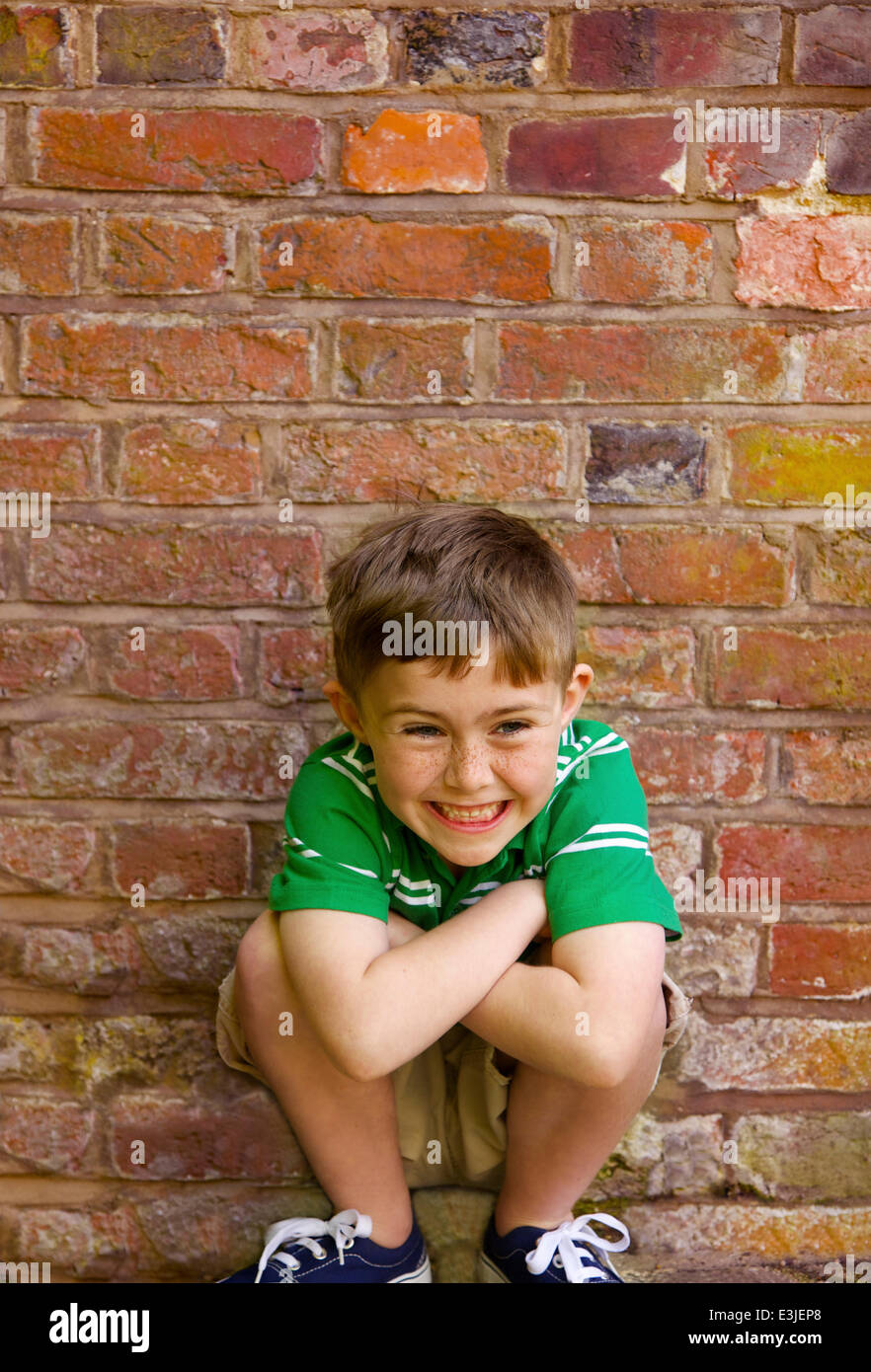 Crouching youth hi-res stock photography and images - Alamy