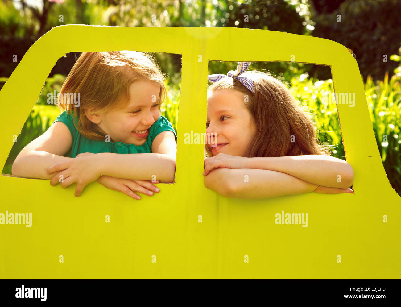 Children playing out the window hi-res stock photography and images - Alamy