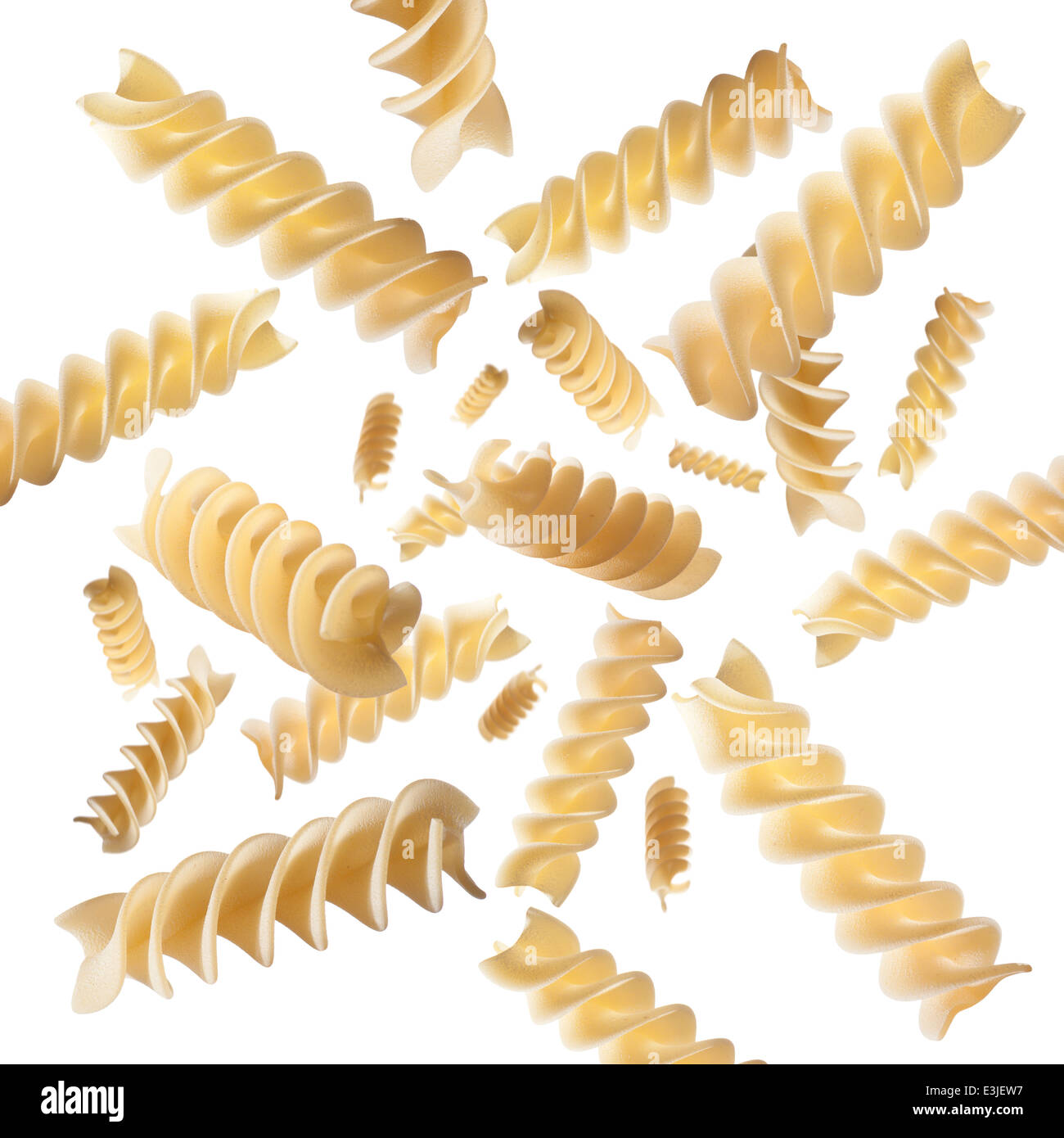 raw pasta rain on white background Stock Photo - Alamy