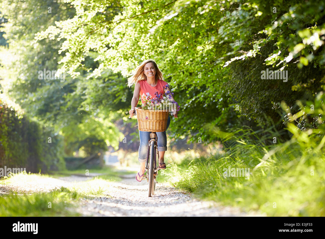 Woman On Cycle Ride In Countryside Stock Photo - Alamy
