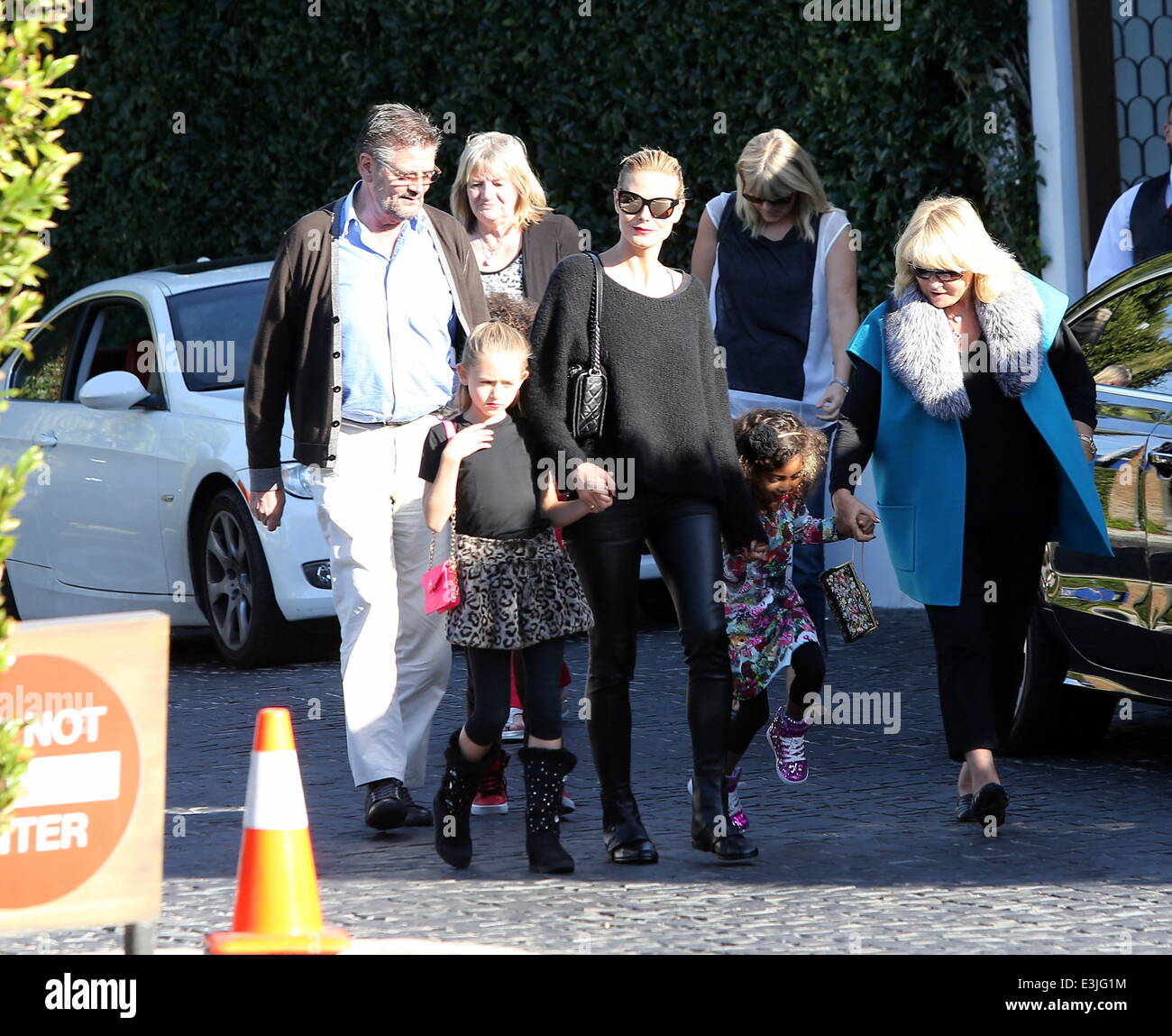 Heidi Klum and family with her parents Erna and Gunther, cross the road ...