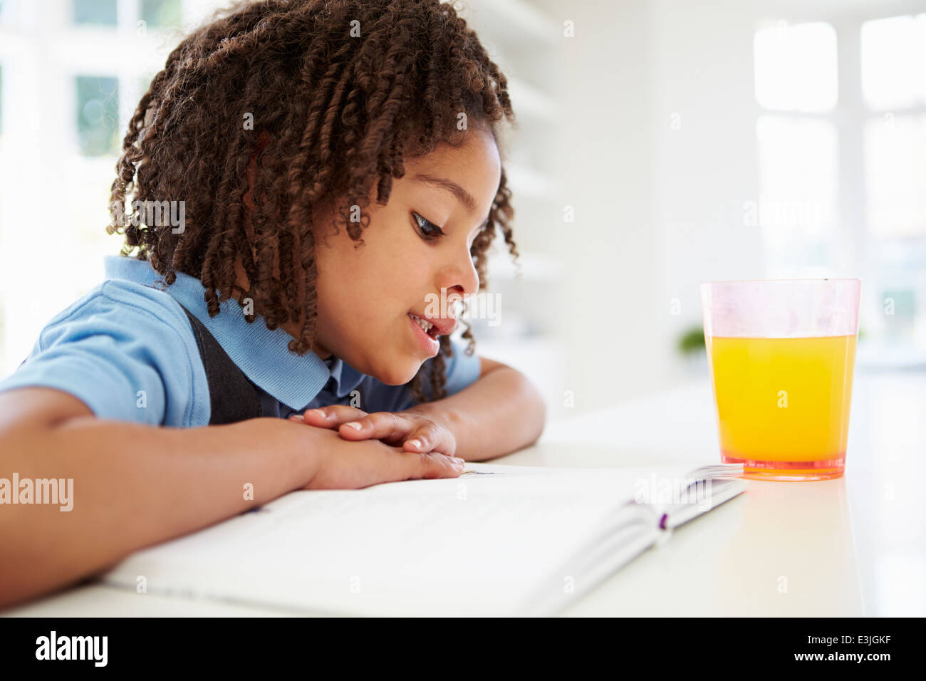 School girl homework uniform hi-res stock photography and images - Alamy