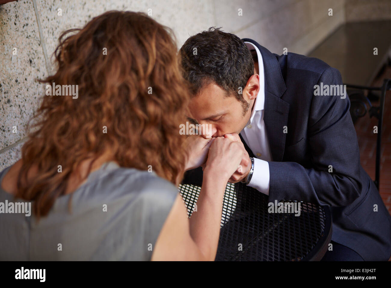 Man kissing women hand hi-res stock photography and images - Alamy