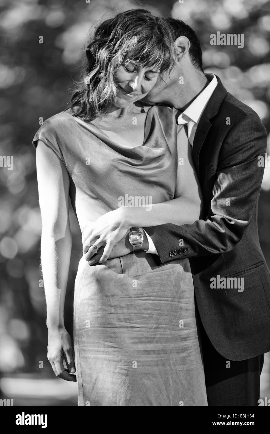Man kissing woman on neck Black and White Stock Photos & Images - Alamy