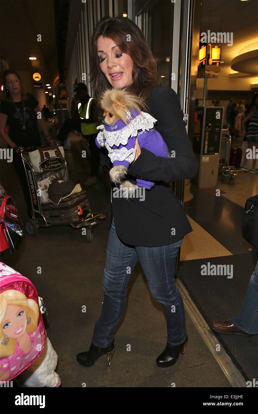 Lisa Vanderpump and her dog Giggy arrive at LAX Featuring: Lisa ...