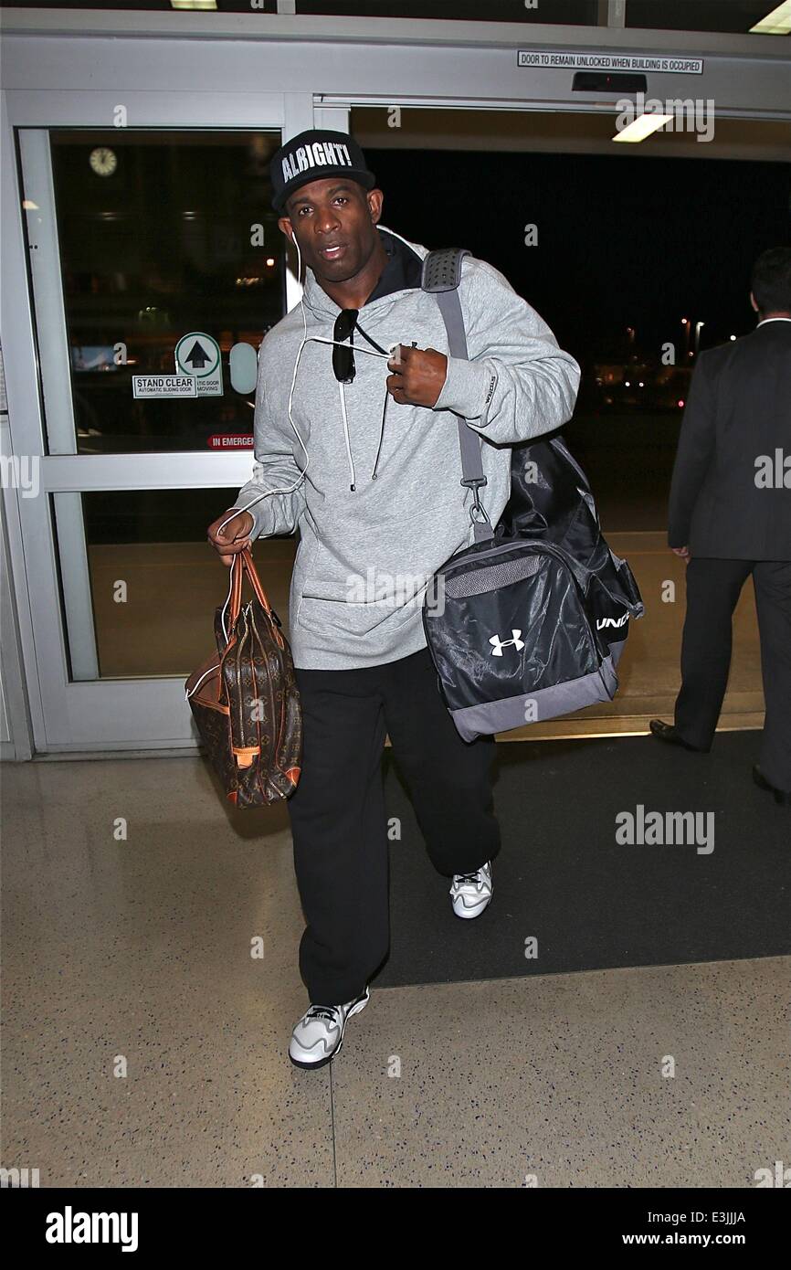 Deion Sanders is all smiles as he leaves LAX for his trip Featuring ...