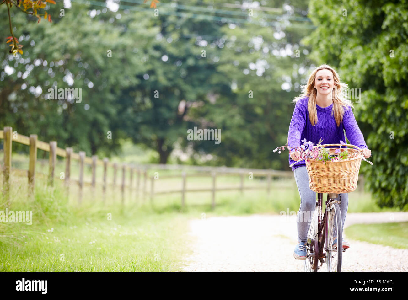 Female bike riding lane hi-res stock photography and images - Alamy